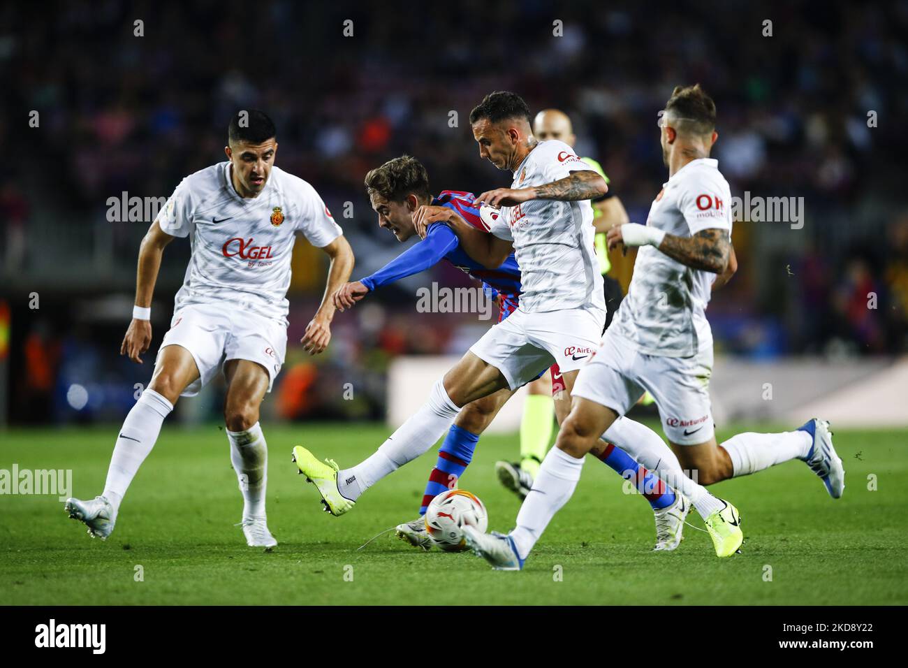 30 Gavi of FC Barcelona defended by Mallorca players during the La Liga ...