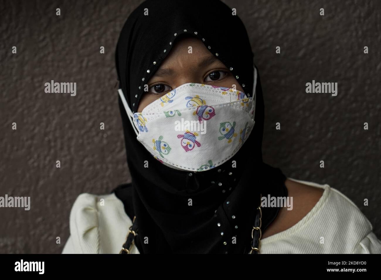 A muslim girl pray first day of the Eid al-Fitr holiday which marks the ...