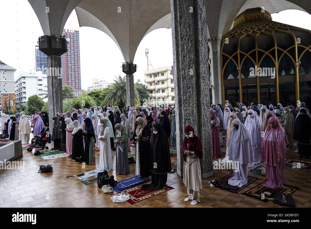 Muslim woman pray first day of the Eid al-Fitr holiday which marks the ...