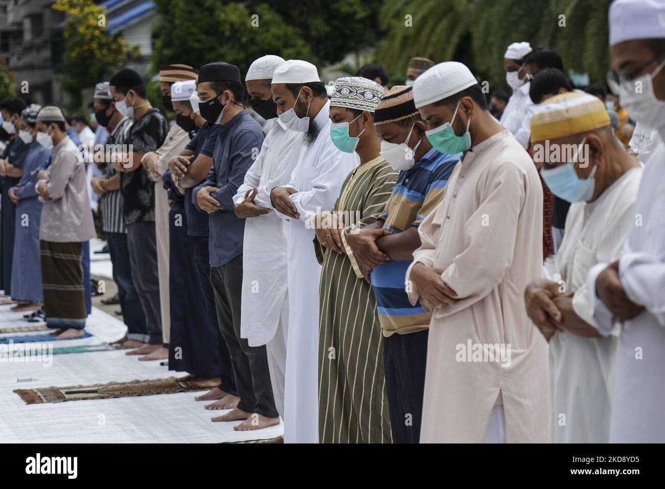 Thai Muslim pray first day of the Eid al-Fitr holiday which marks the ...