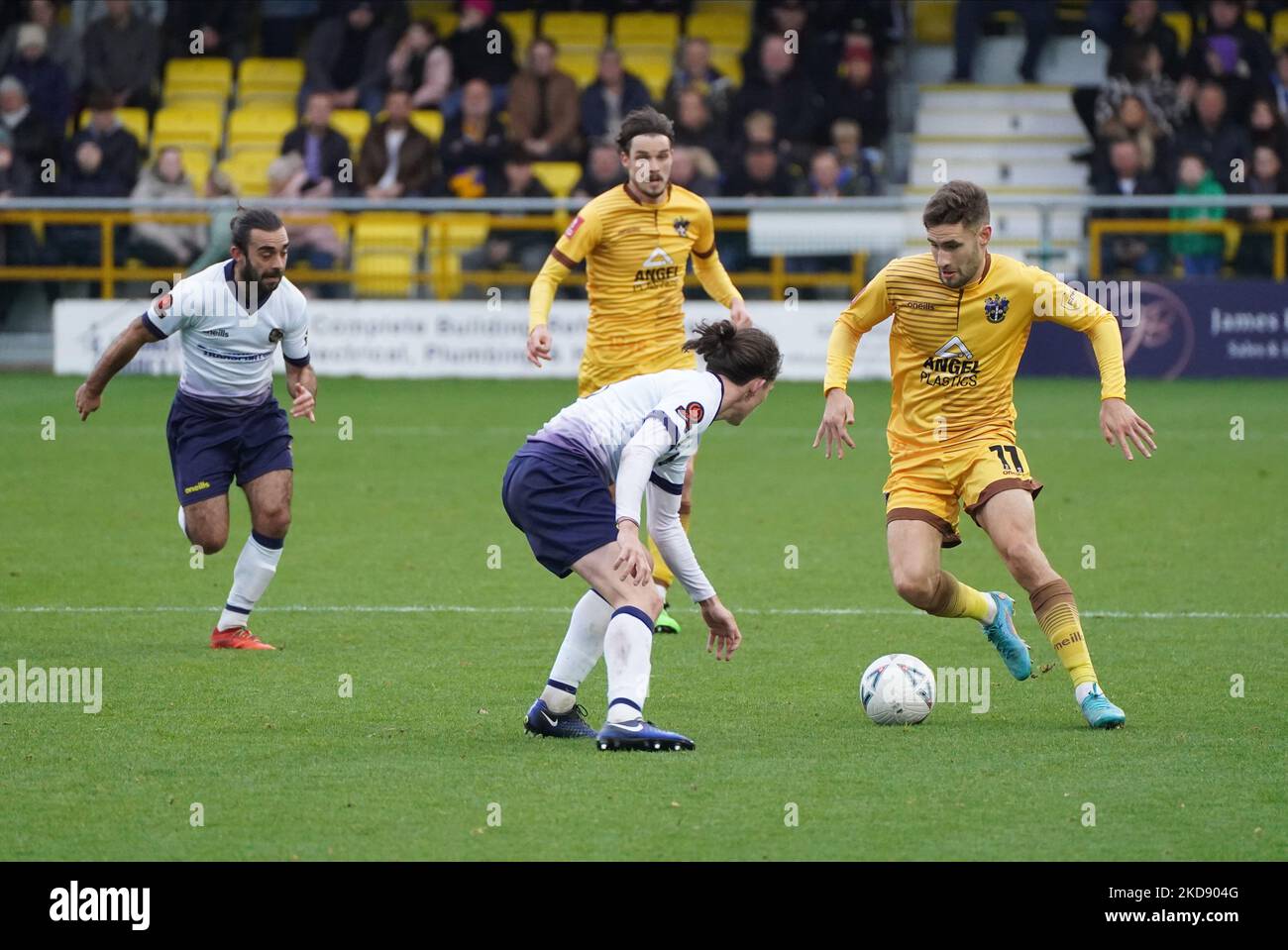 Sutton United's Will Randall (right) controls the ball during the ...