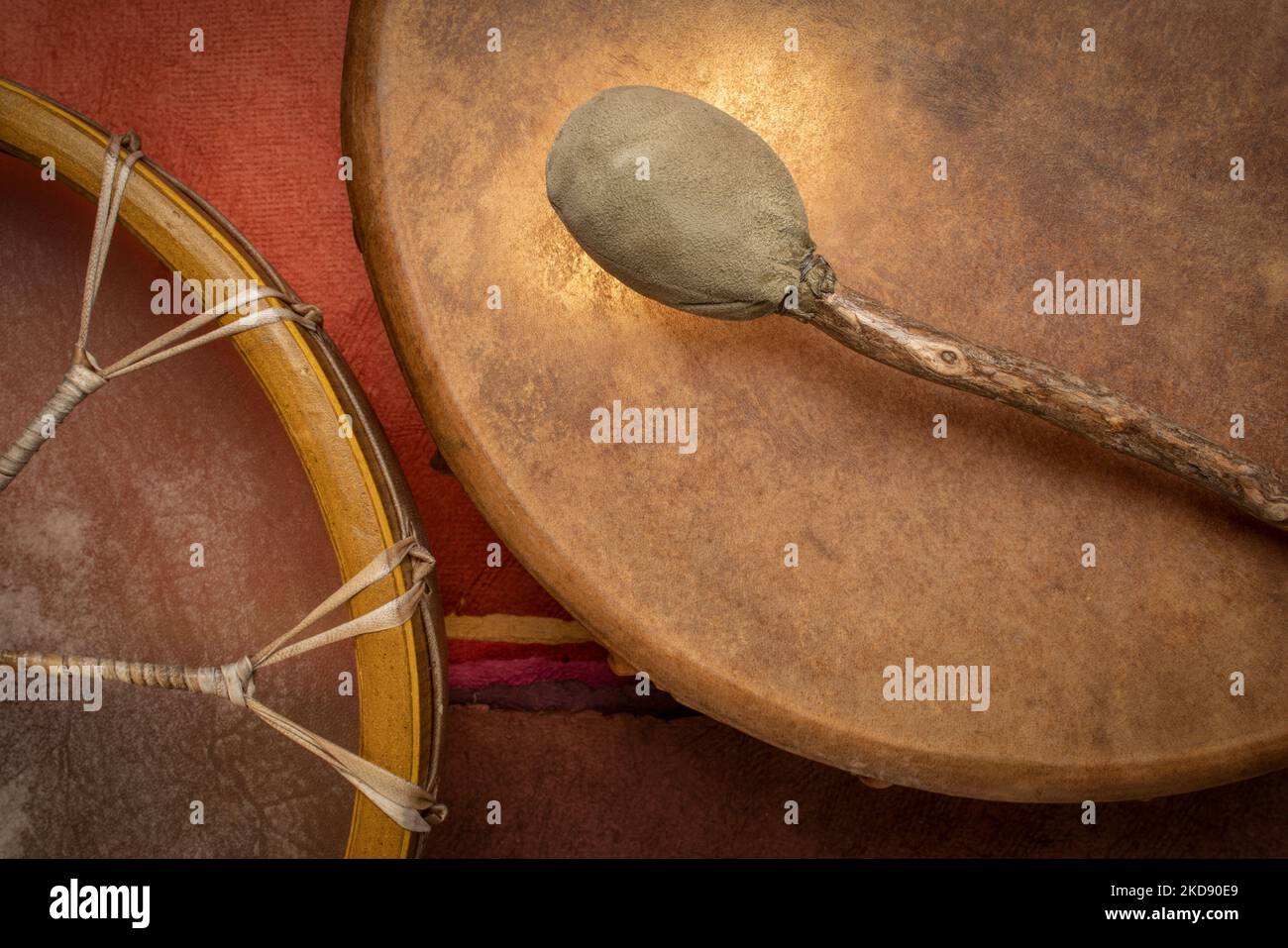 two handmade, native American style, shaman frame drums covered by goat ...