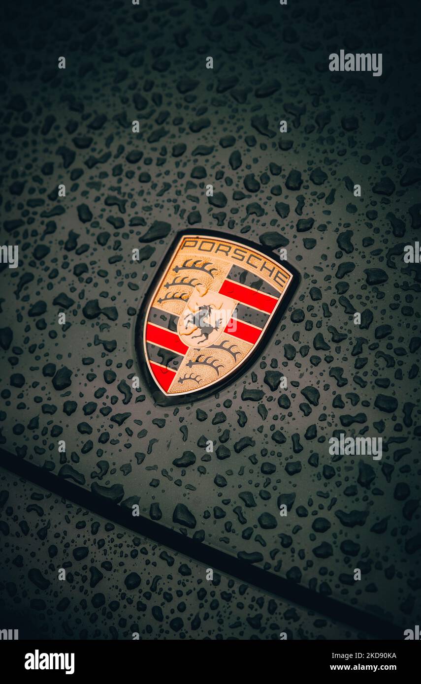 A vertical shot of a Porche car logo Stock Photo - Alamy