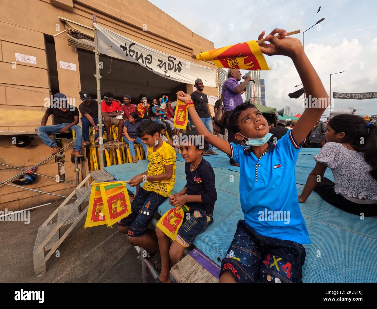 Sri Lankans children look on during a protest in front of president ...