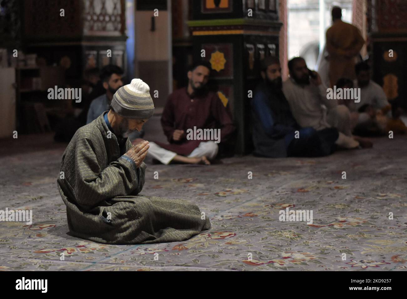 Kashmiri people pray in a shrine on Eid ul Fitr in Srinagar, Indian ...