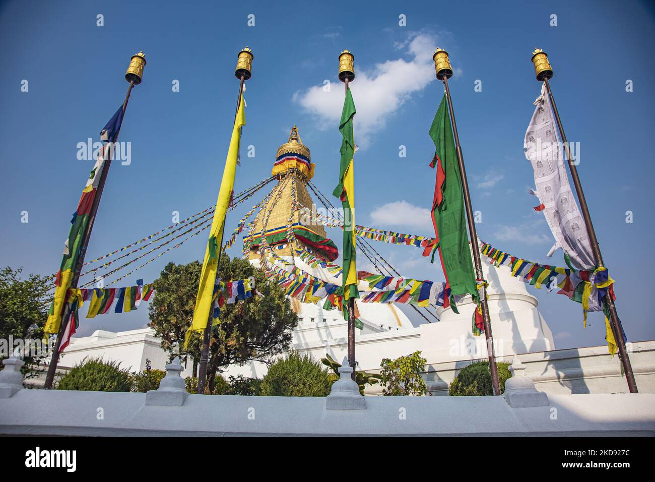 Closeup at the golden top with the Eyes of the stupa, where the praying ...