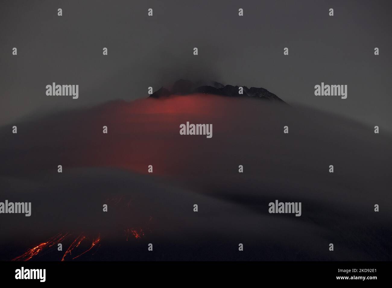 Mount Merapi, a volcanic mountain spews lava as it erupts several times ...