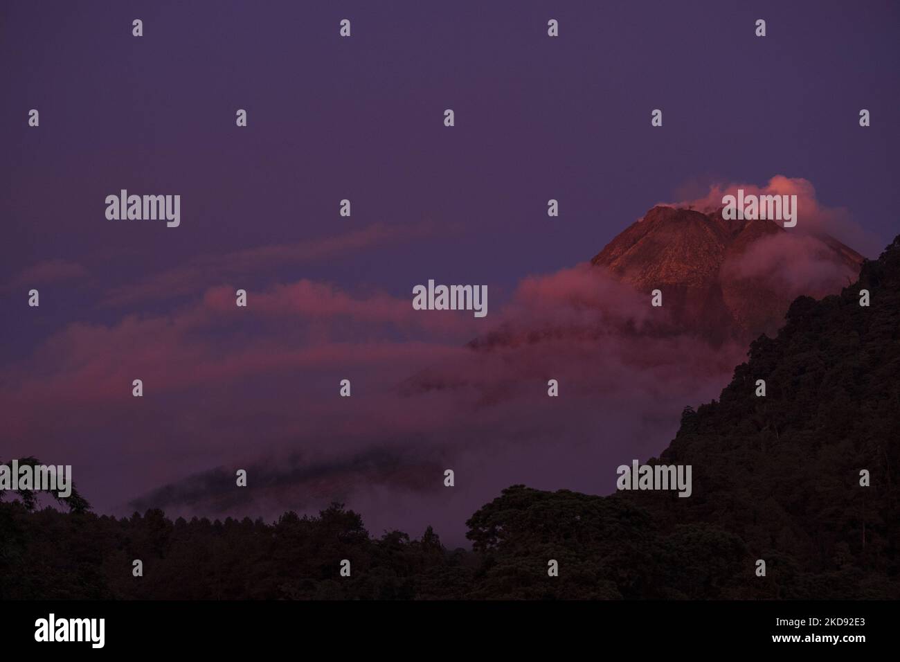 The scenery of Mount Merapi volcano by sunset is seen from Turgo ...