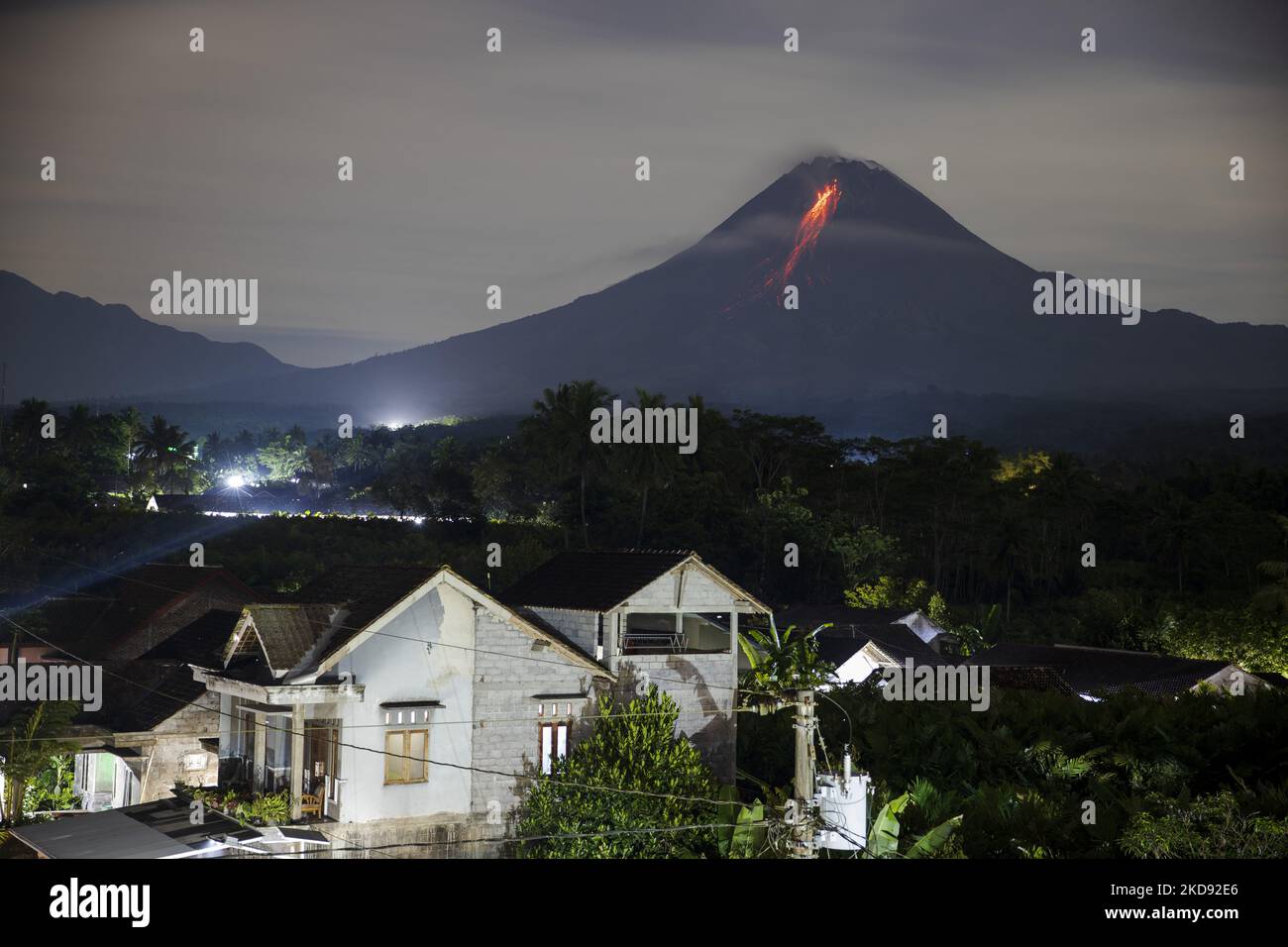 Mount Merapi, a volcanic mountain spews lava as it erupts several times ...