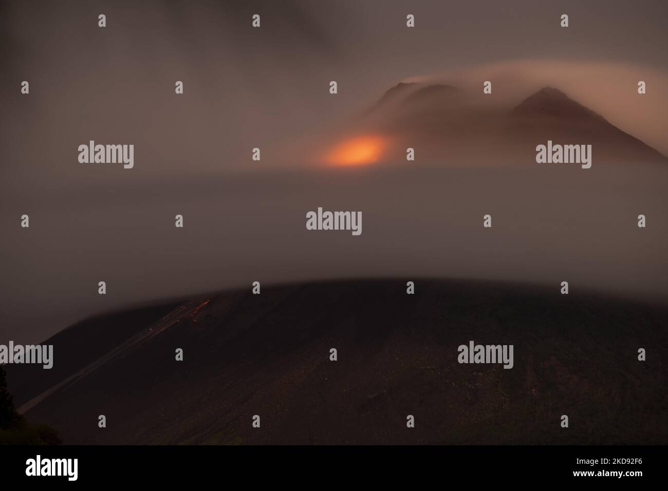 The scenery of Mount Merapi volcano by sunset is seen from Turgo ...