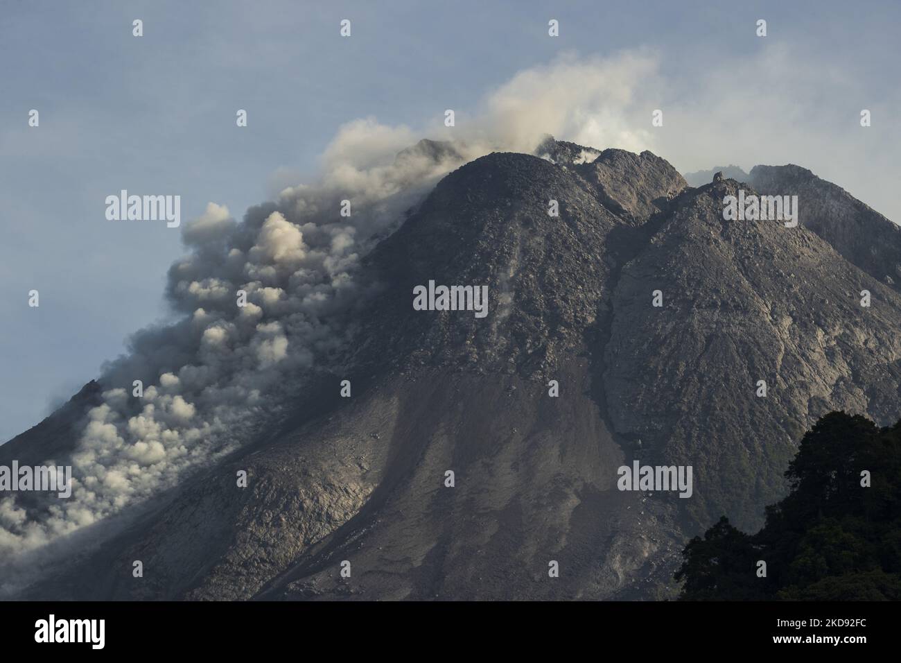 Mount Merapi, a volcanic mountain spews volcanic material as it erupts ...