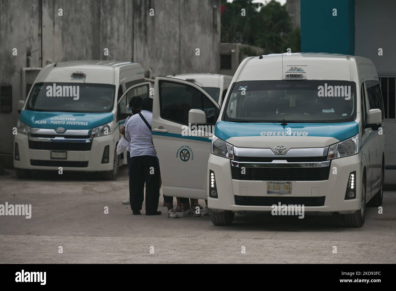 Vans collectivo waiting for passengers in Playa Del Carmen. On Friday ...