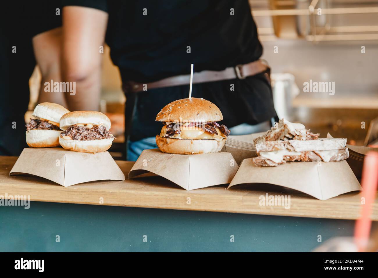 Burgers at a burger feast. Dinner Hamburger Food Feast Party. Big ...