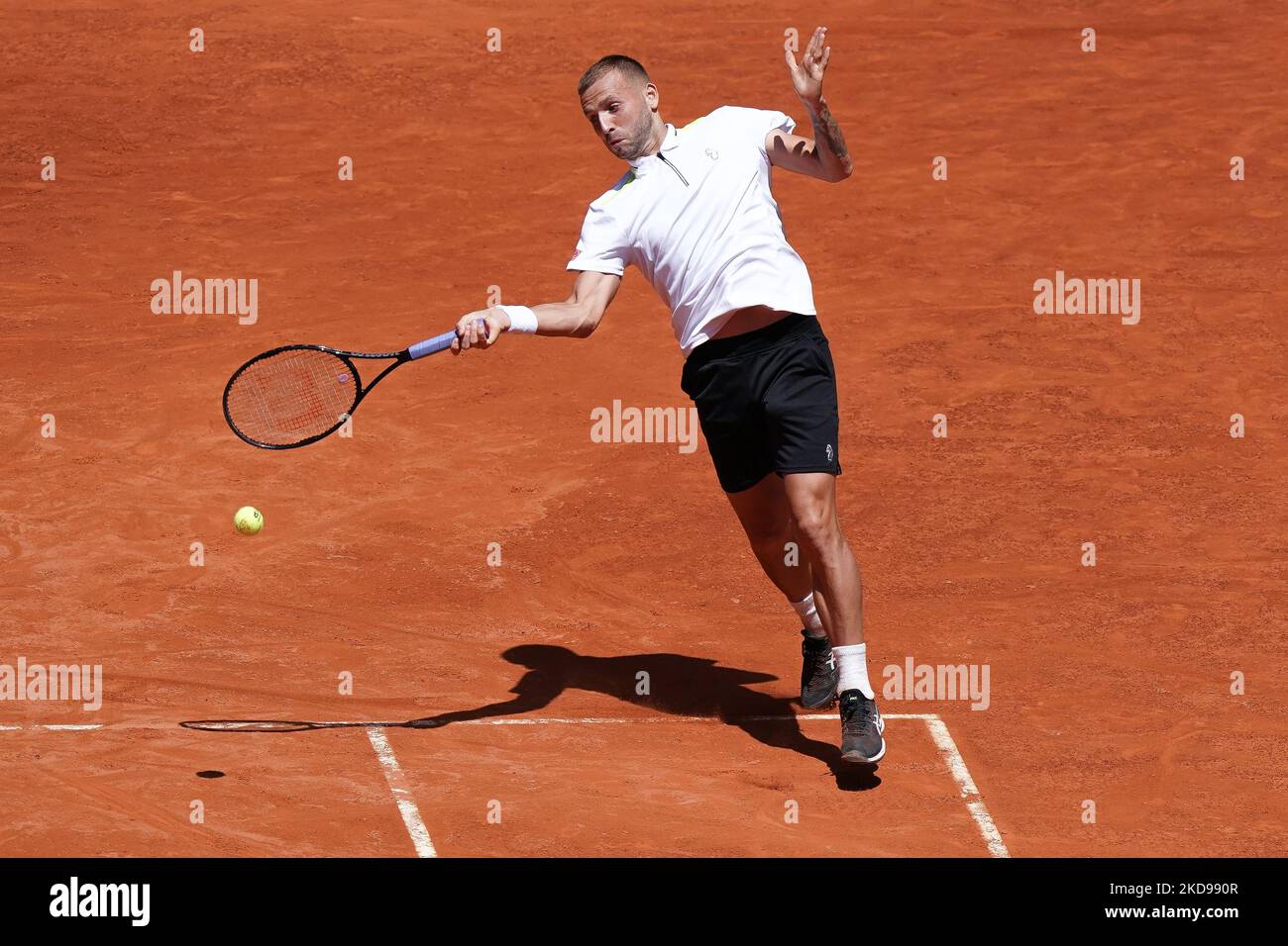 Dan Evans of Great Britain player a point in their round of 16 match ...