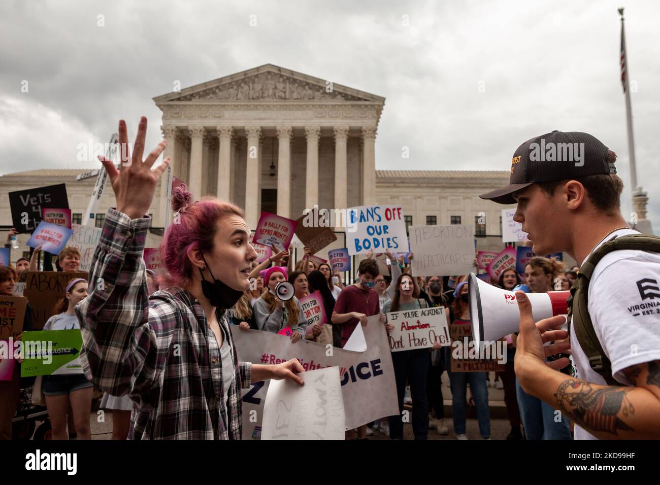Two counter protesters hi-res stock photography and images - Alamy