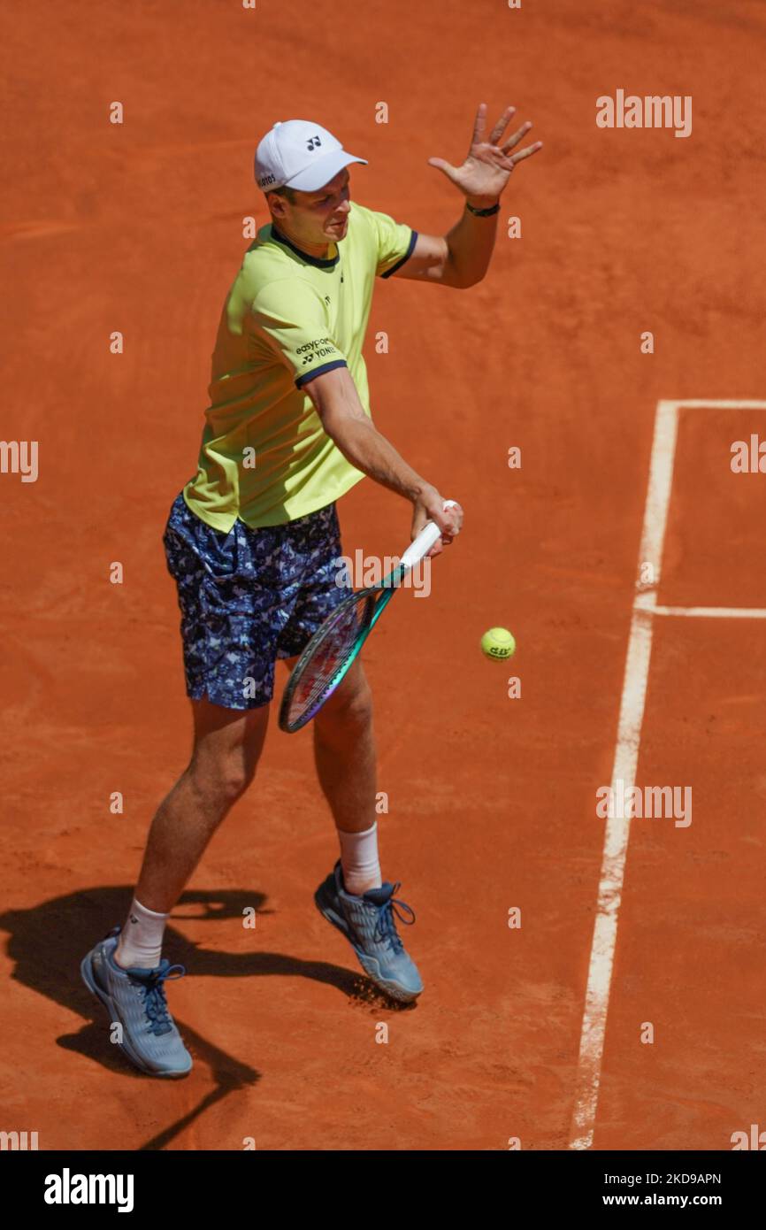Hubert Hurkacz of Poland plays a in their quarter-final match against ...