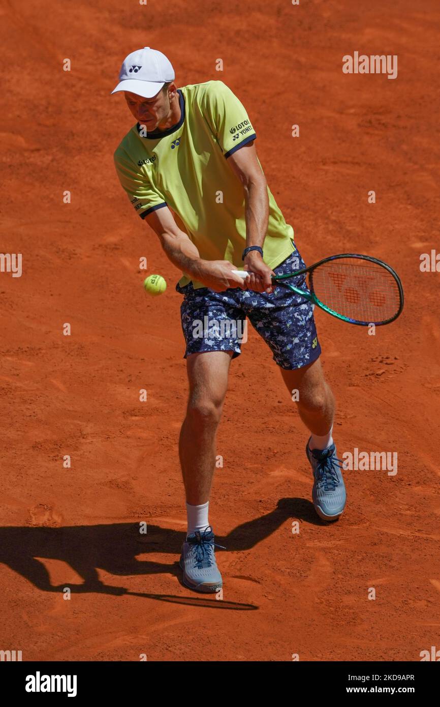 Hubert Hurkacz of Poland plays a in their quarter-final match against ...
