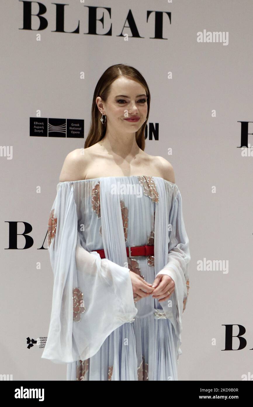 Actress Emma Stone and pose for photographers before the premiere of ...