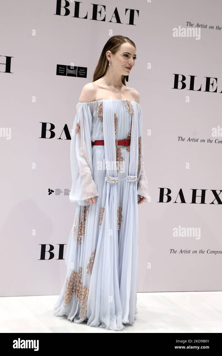 Actress Emma Stone and pose for photographers before the premiere of ...