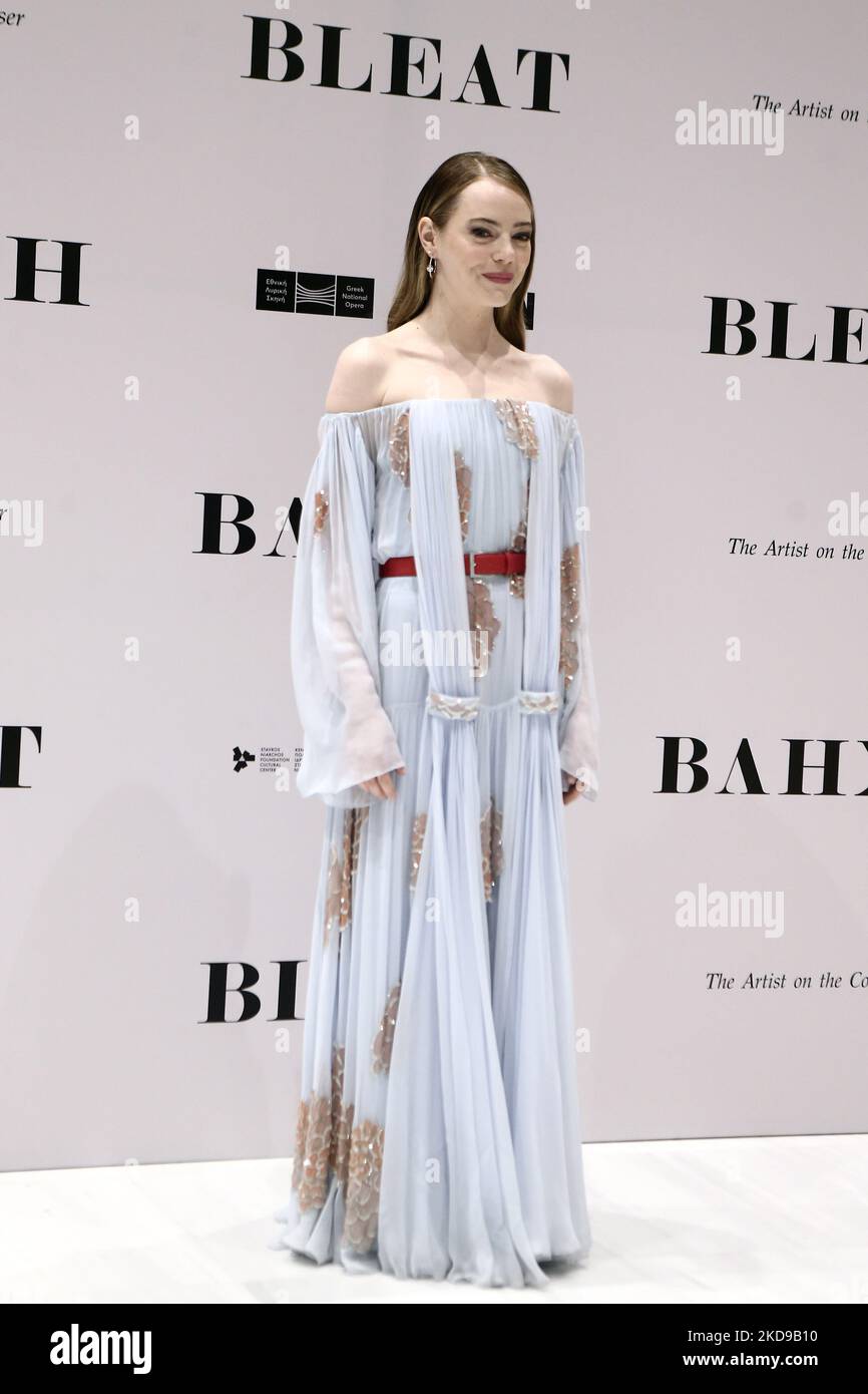 Actress Emma Stone and pose for photographers before the premiere of ...