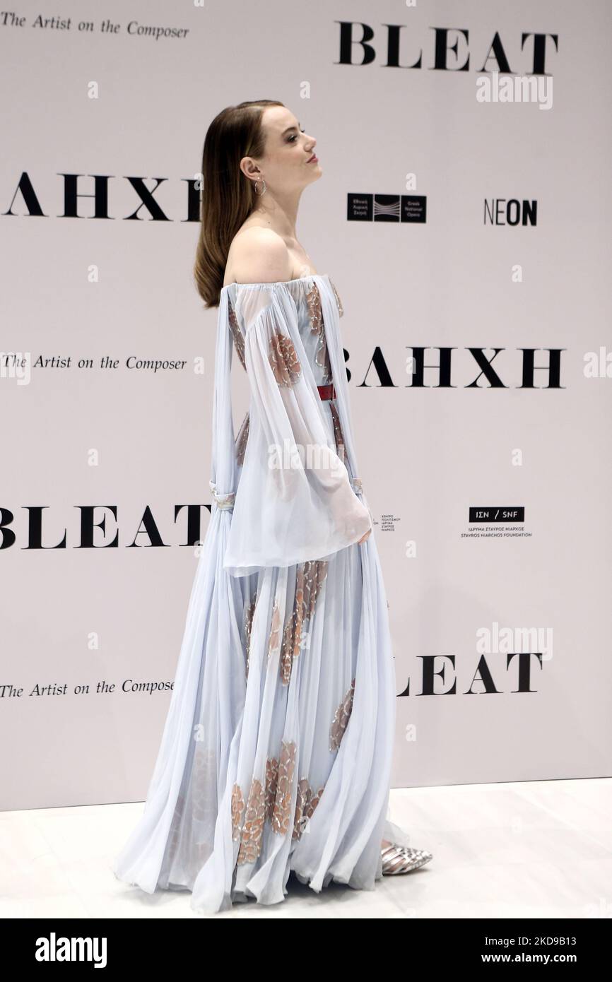 Actress Emma Stone and pose for photographers before the premiere of ...