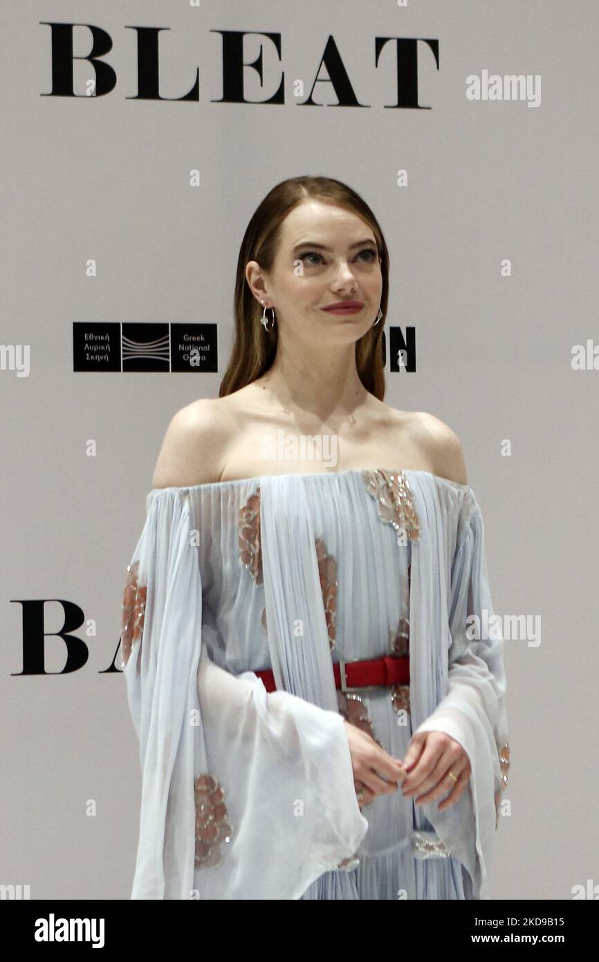 Actress Emma Stone and pose for photographers before the premiere of ...