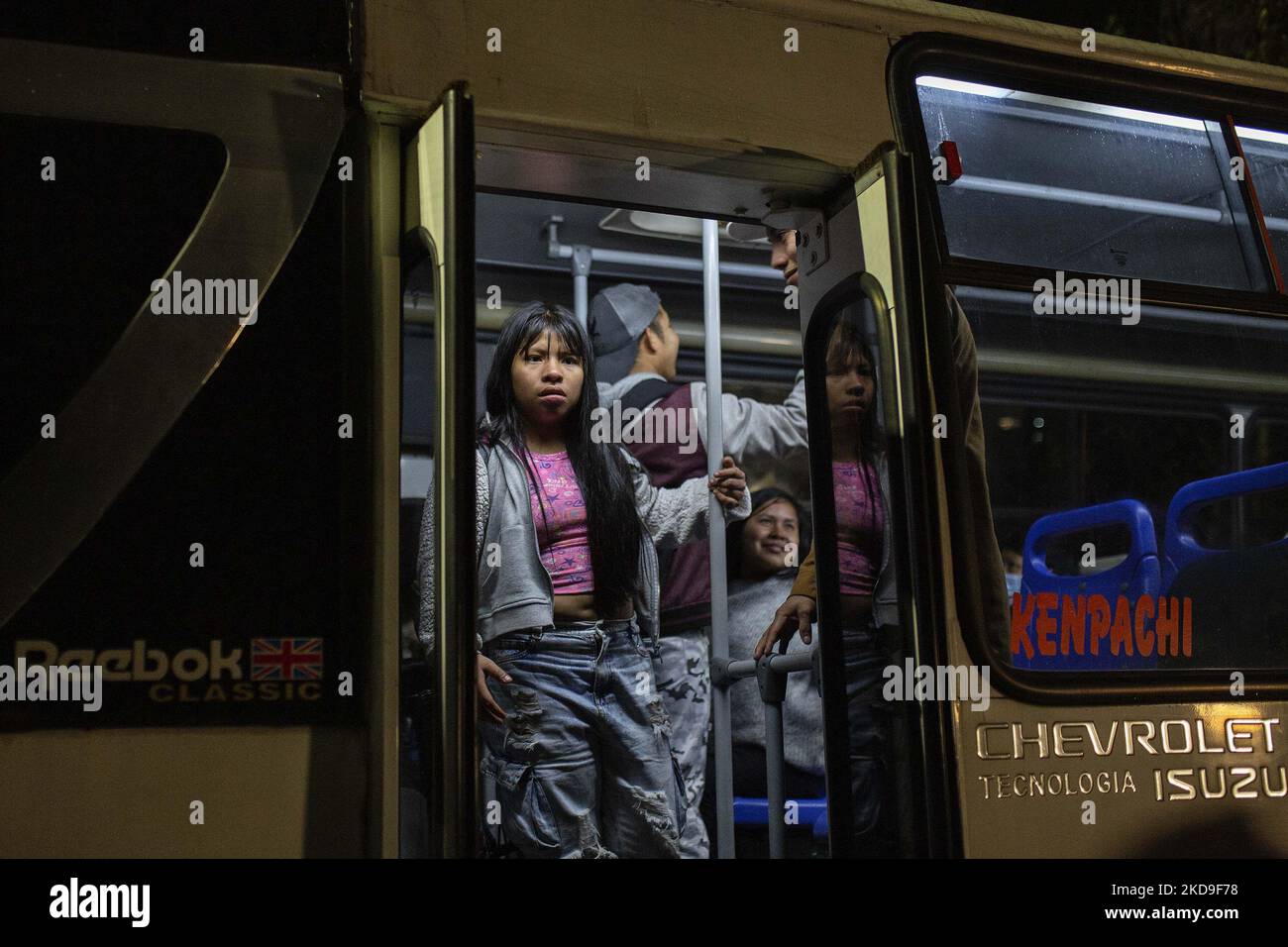 An indigenous woman on the bus, moments before leaving the National ...