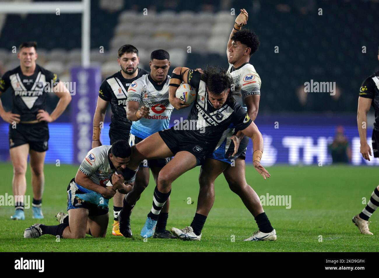 New Zealand's Joseph Tapine is tackled during the Rugby League World ...