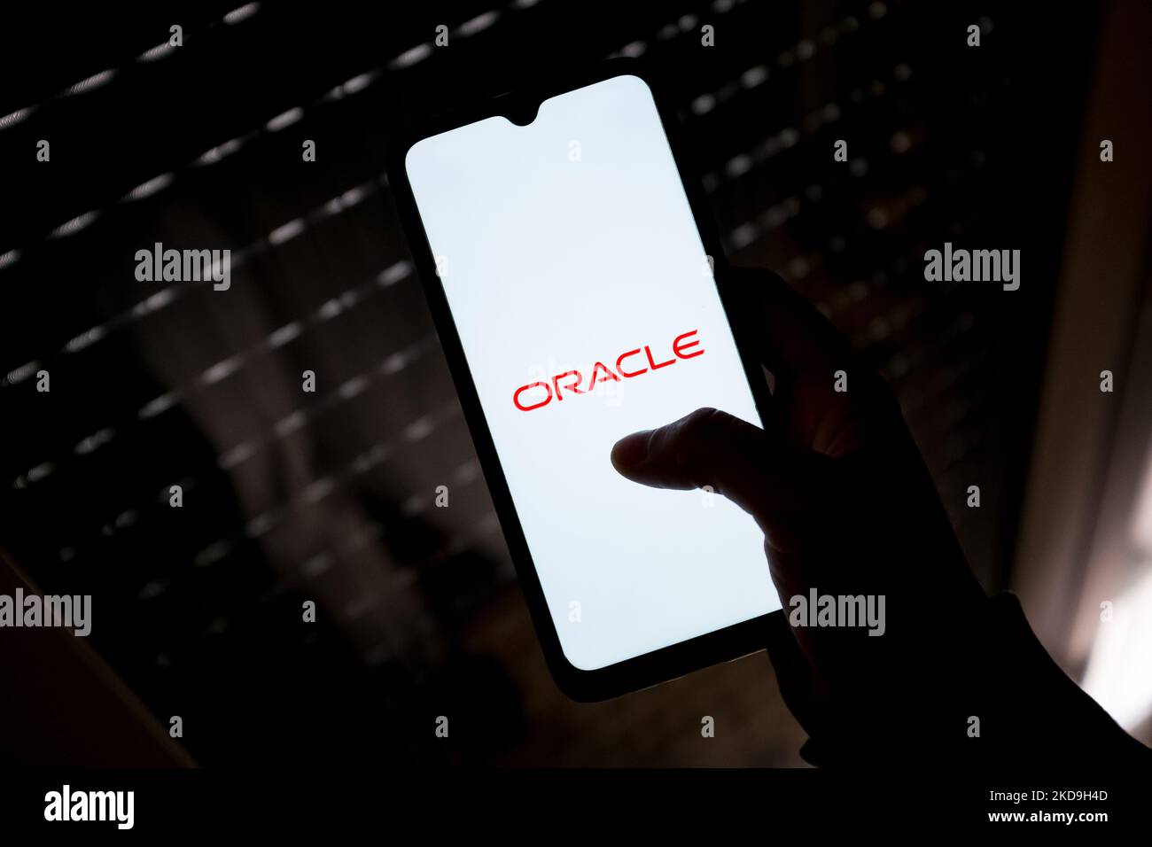 In this photo illustration an Oracle Corporation logo seen displayed on ...