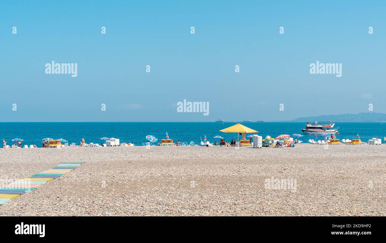 Batumi, Georgia - 30 August, 2022: People relax on the beach in Batumi ...