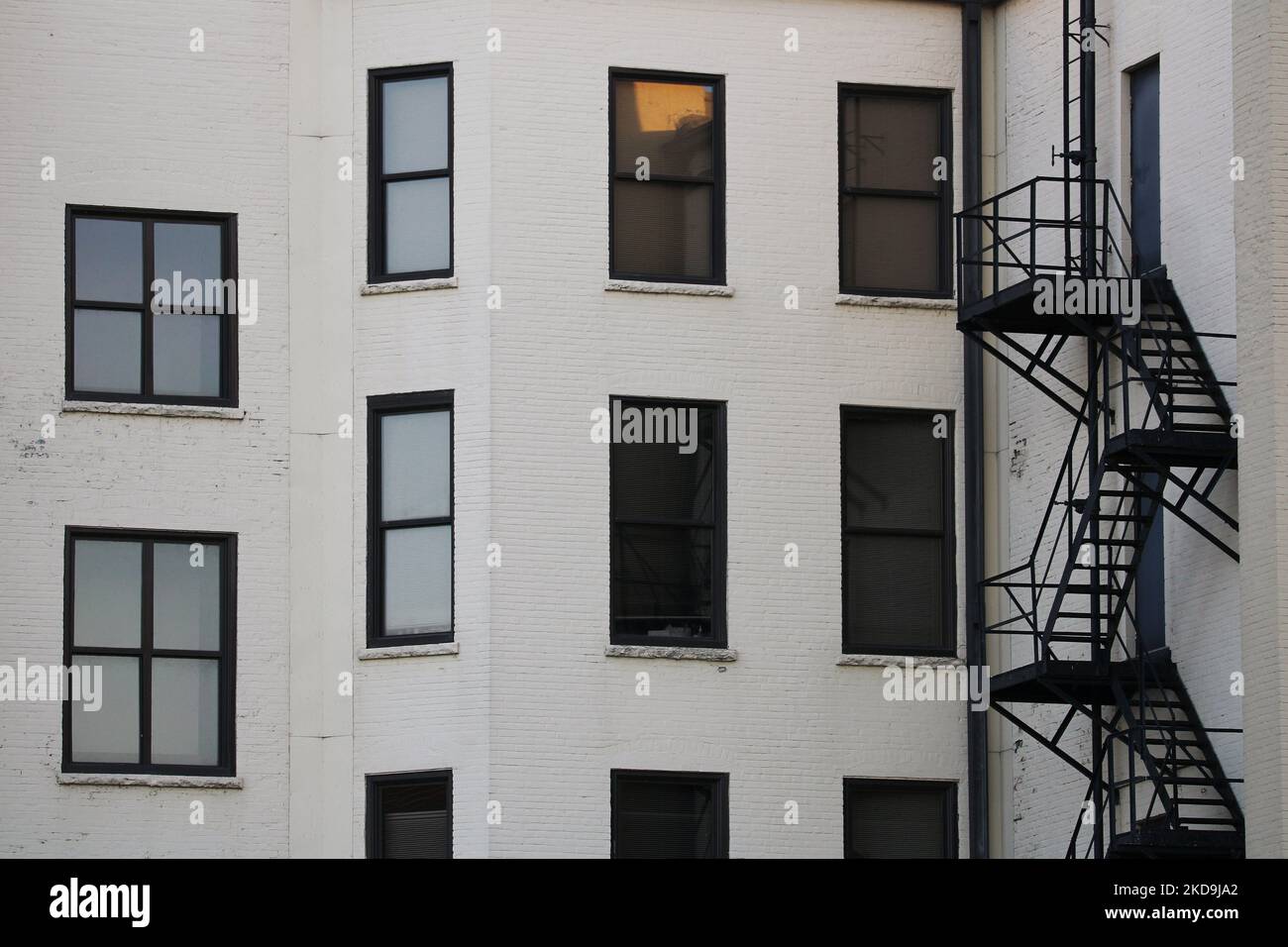 A close-up of a building with fire escape stairs Stock Photo - Alamy