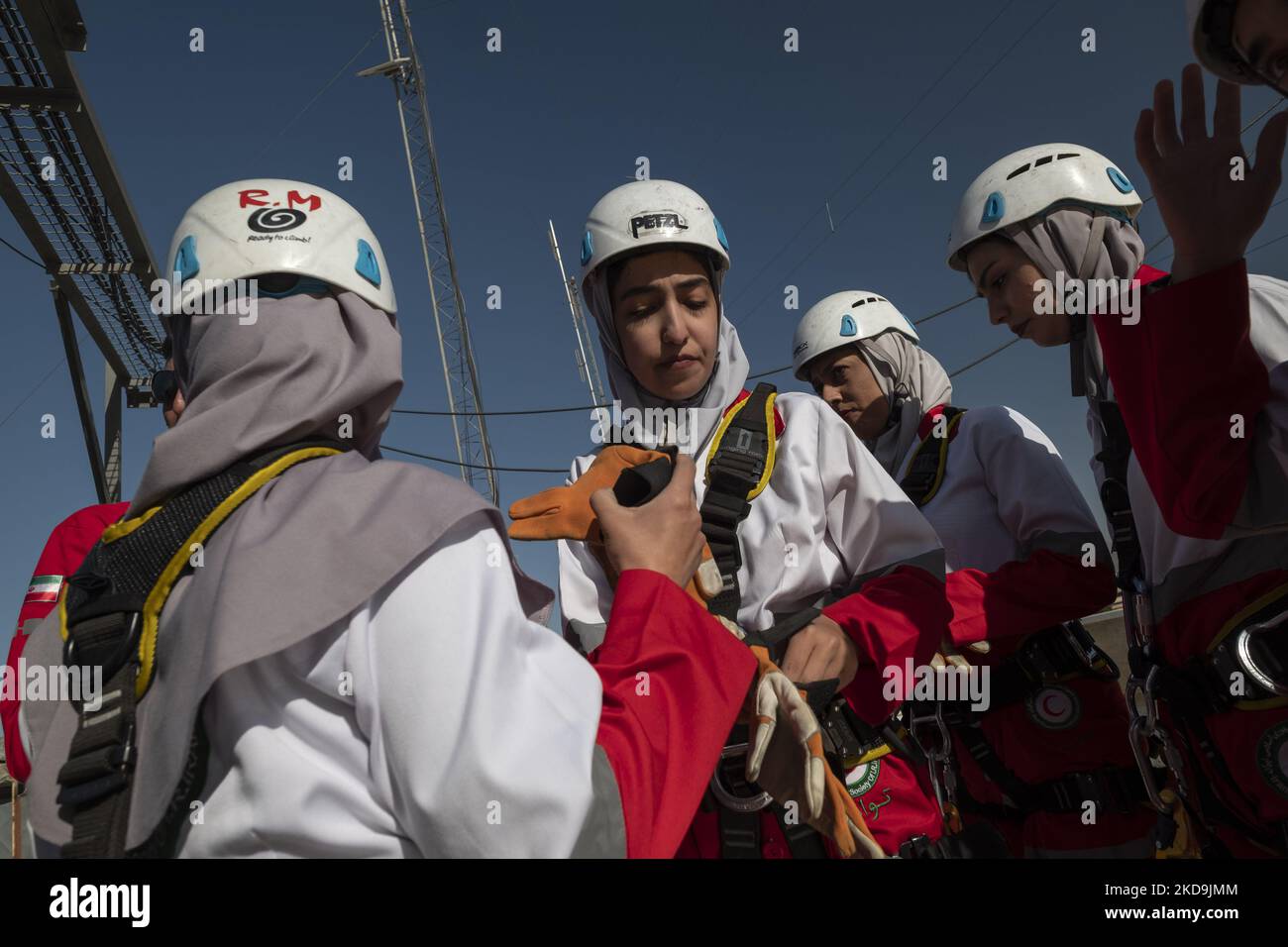 Female members of the Iranian Red Crescent Society prepare to perform ...