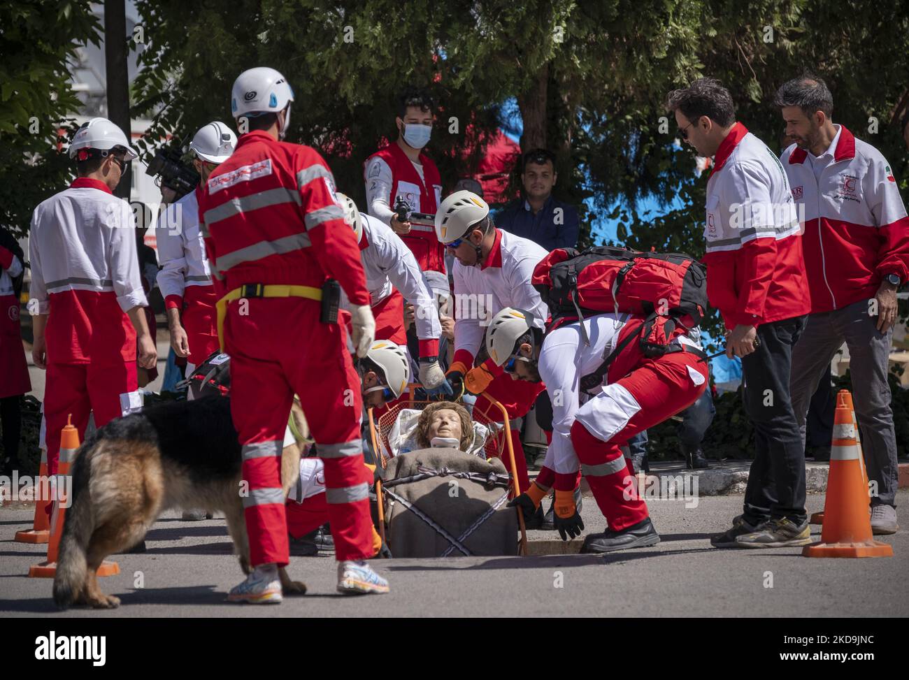 Members of the Iranian Red Crescent Society perform with a mannequin in ...