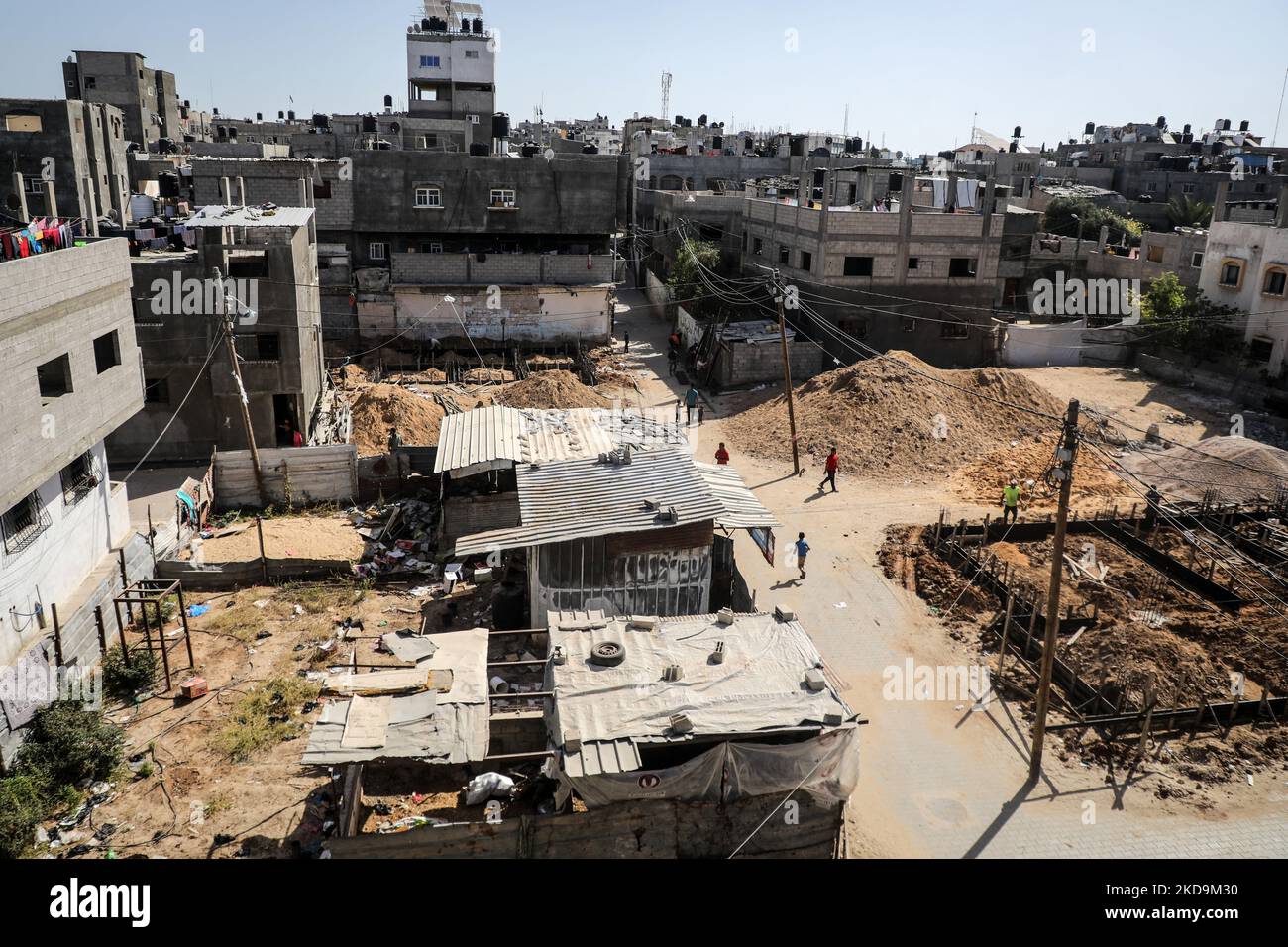 A general view shows the site of destroyed houses under renovation in ...