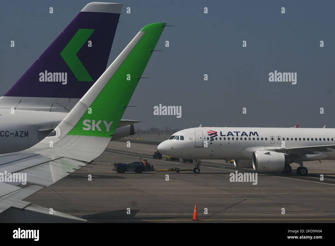 LATAM Airlines and SKY Airline planes seen at Jorge Chavez ...