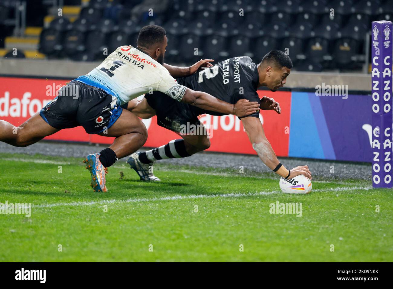 New Zealand's Ronaldo Mulitalo scores during the Rugby League World Cup ...