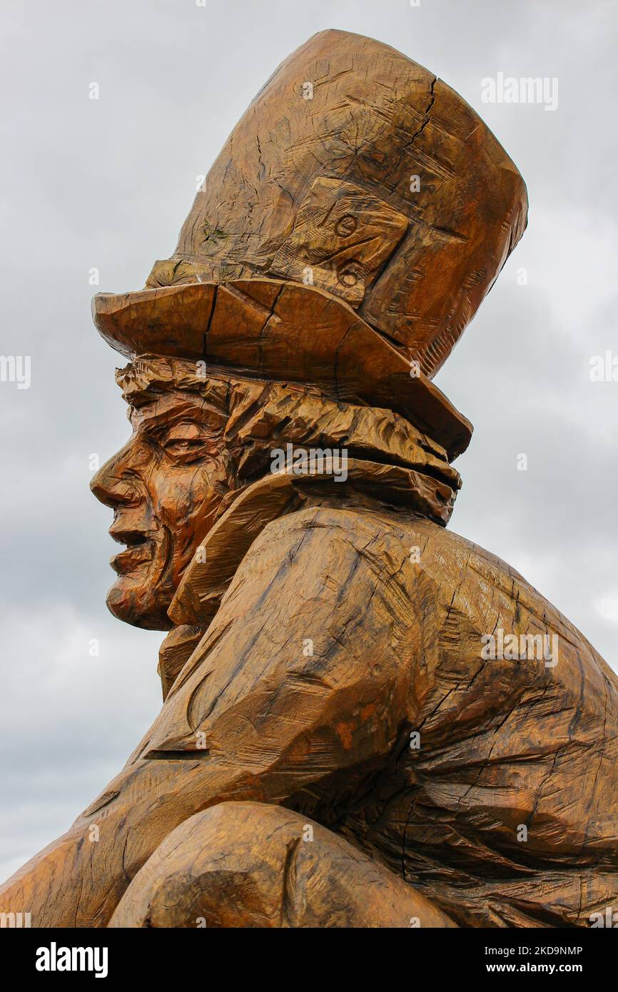 A vertical closeup of Mad Hatter Sculpture (Alice in Wonderland) in ...