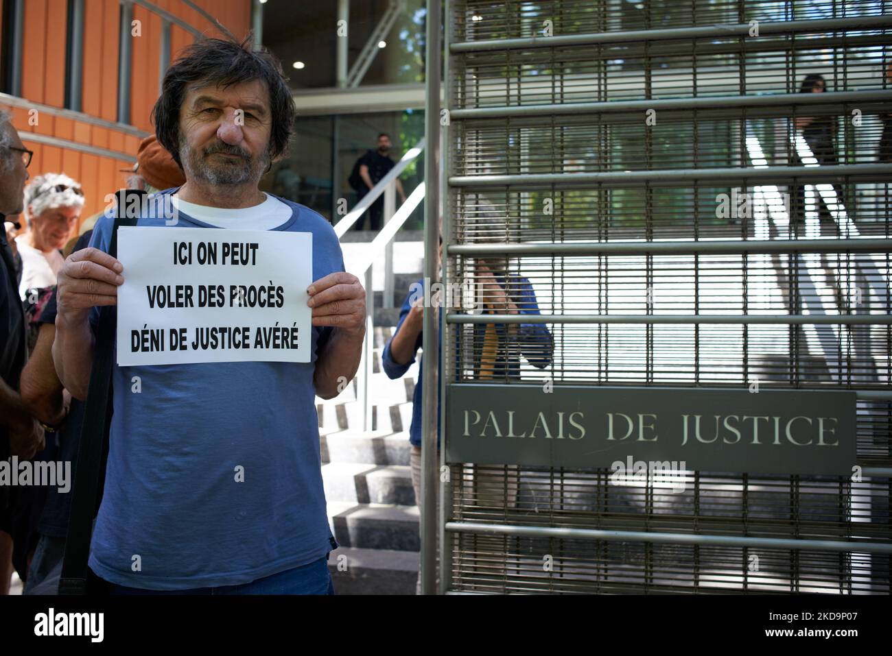 A 'Volunteer Reaper' is pictured in front of the courthuse of Toulouse ...