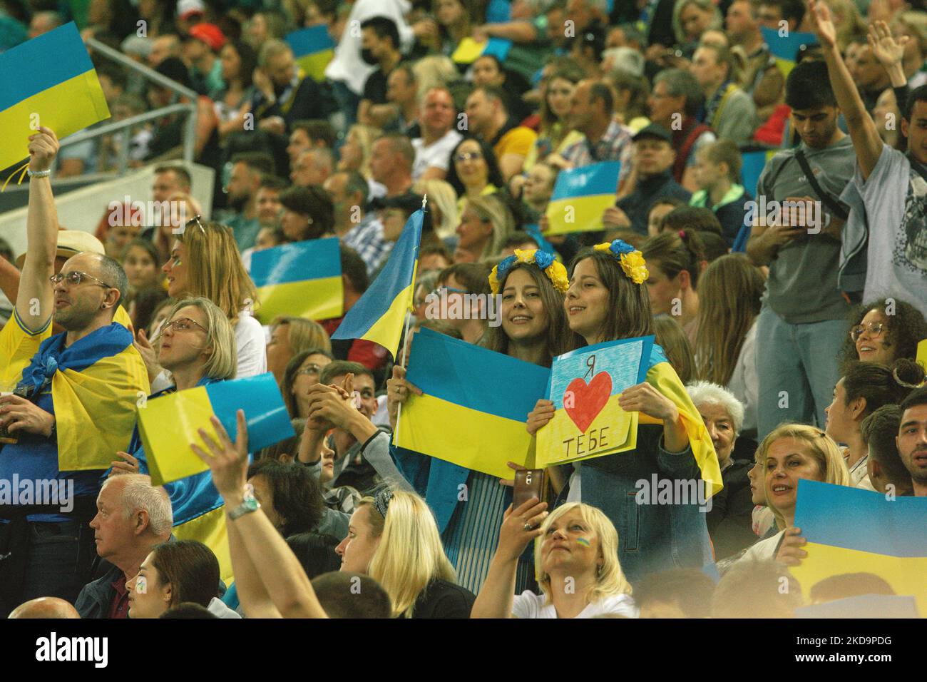 Ukraine football fans with Ukrainian flags are seen in the stadium of ...