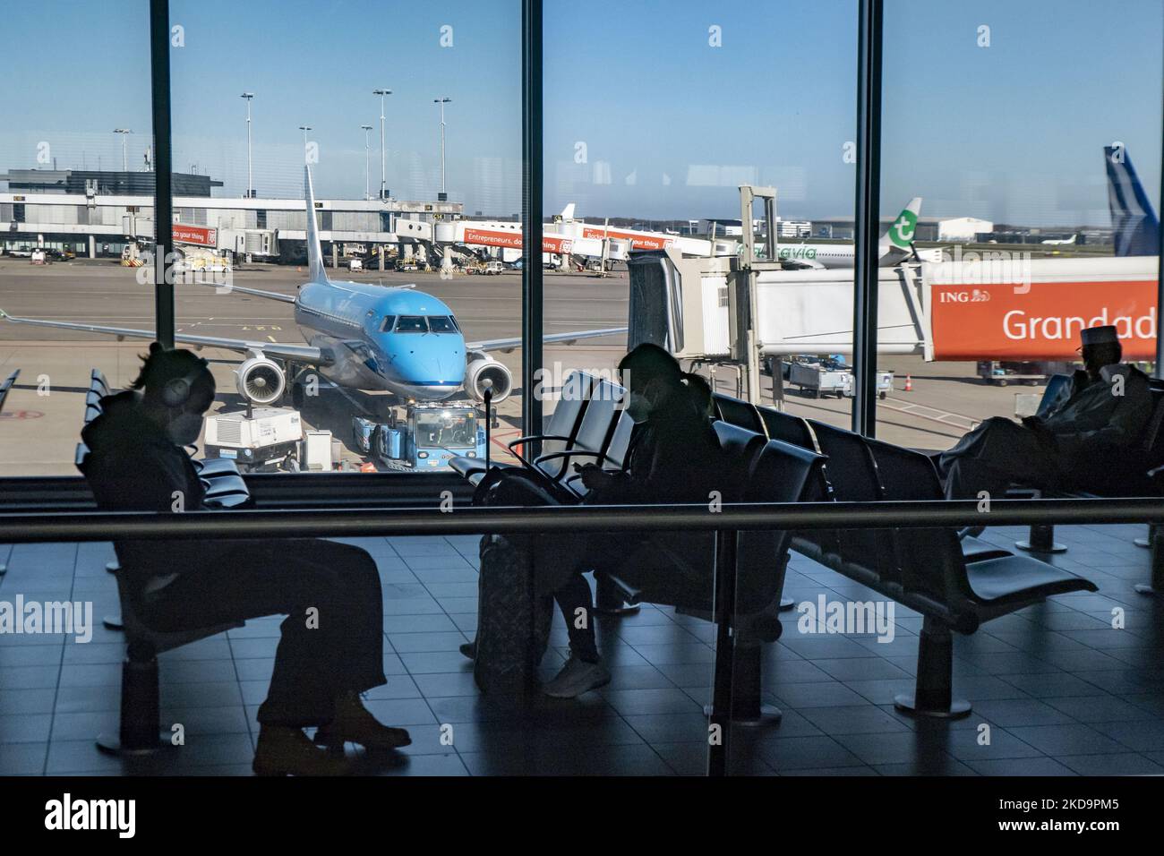 Passengers as seen wearing face masks inside the terminal, the ...