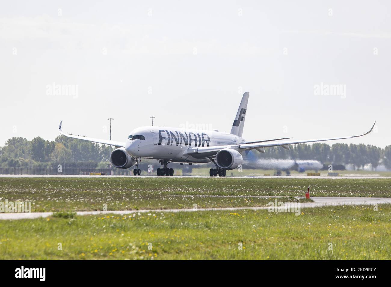 Finnair Airbus A350-900 aircraft as seen during rotation, take off and ...