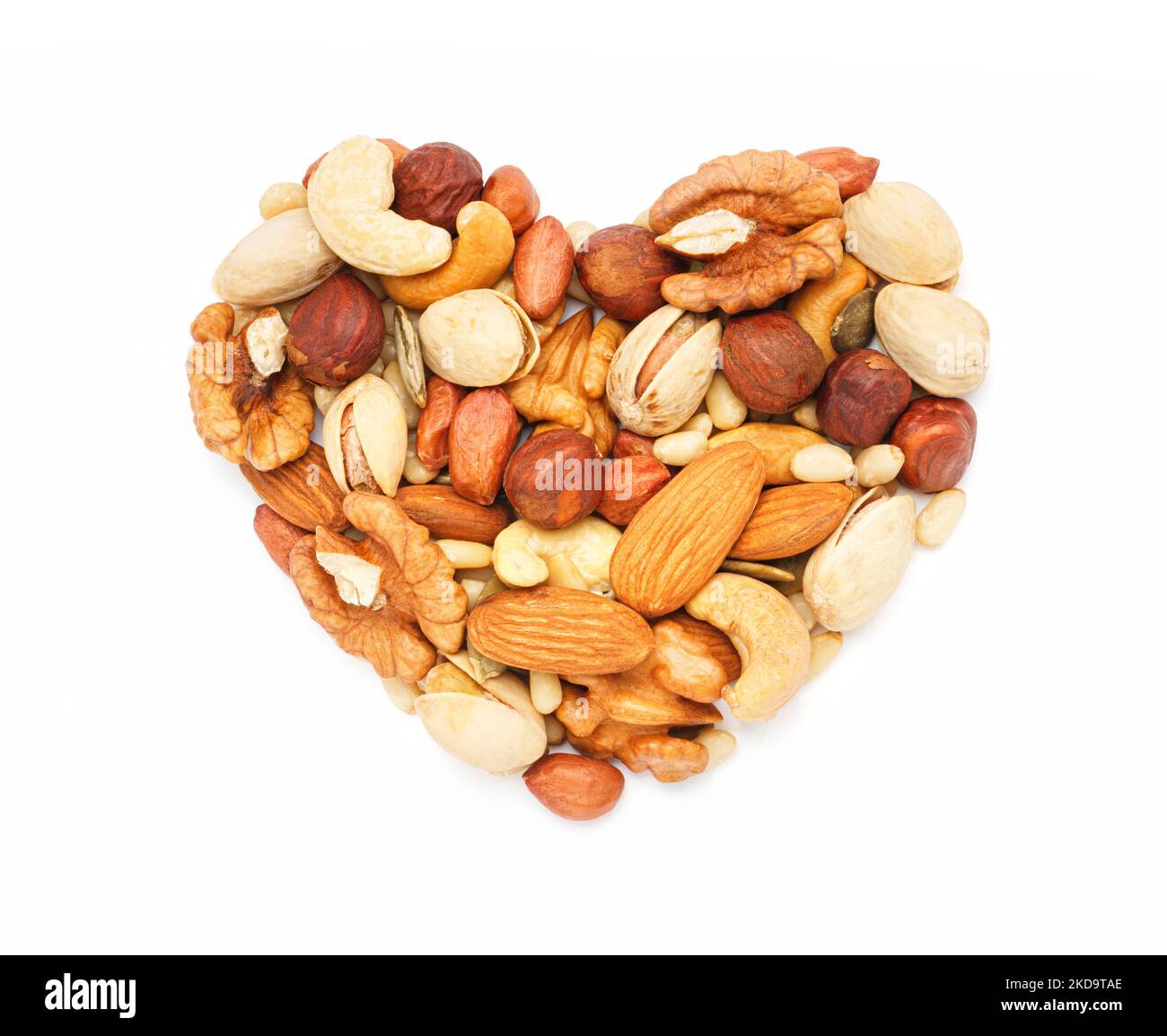 Heart shaped nuts and seeds isolated on white background close-up, flat lay, top view Stock ...