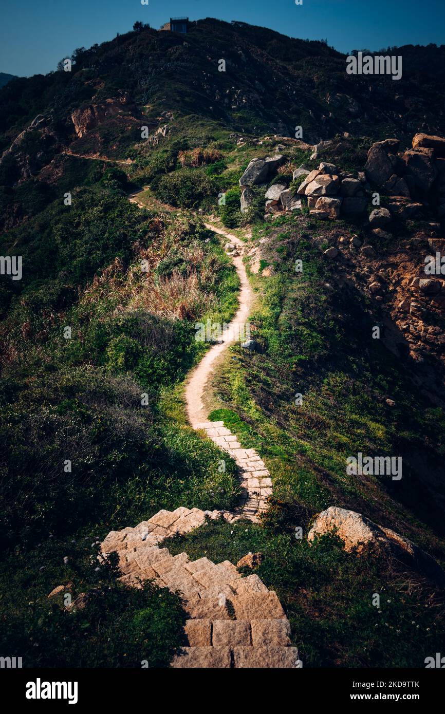The outdoor stone stairs path going down the hill Stock Photo - Alamy