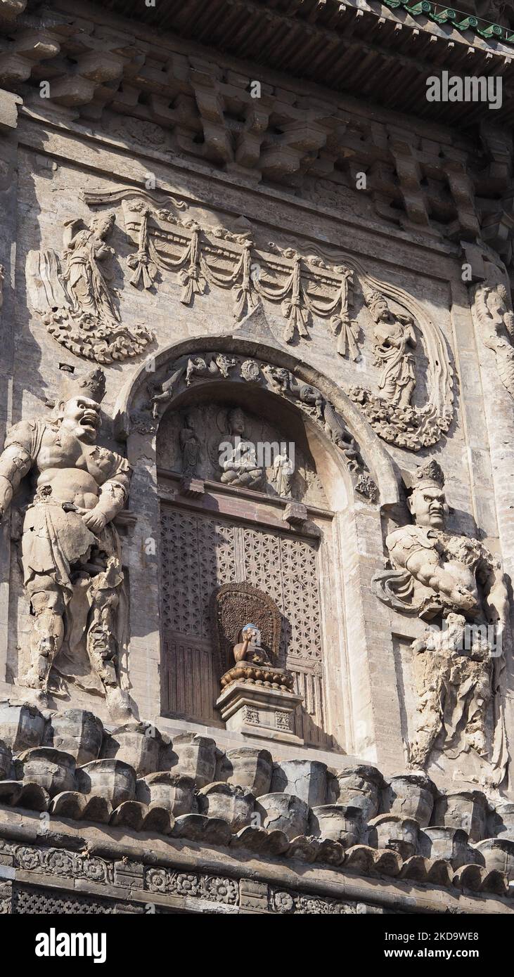 A vertical shot of Chinese architecture temple with design in daylight ...