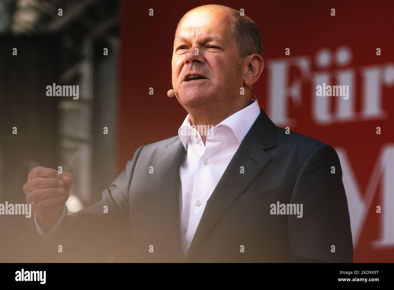 Olaf Scholz, Chancellor of Germany, speaks to the crowd on the stage at ...
