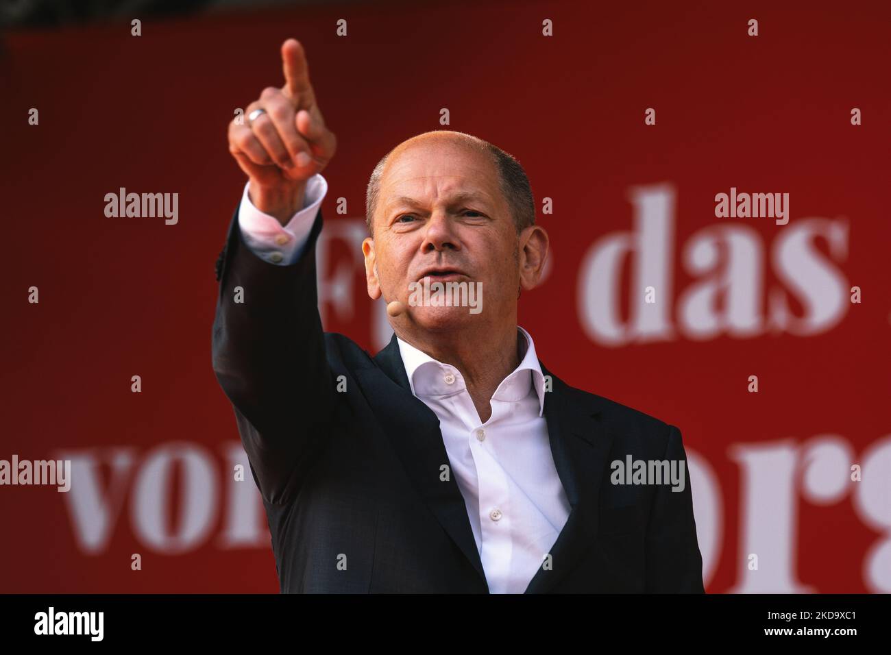 Olaf Scholz, Chancellor of Germany, speaks to the crowd on the stage at ...