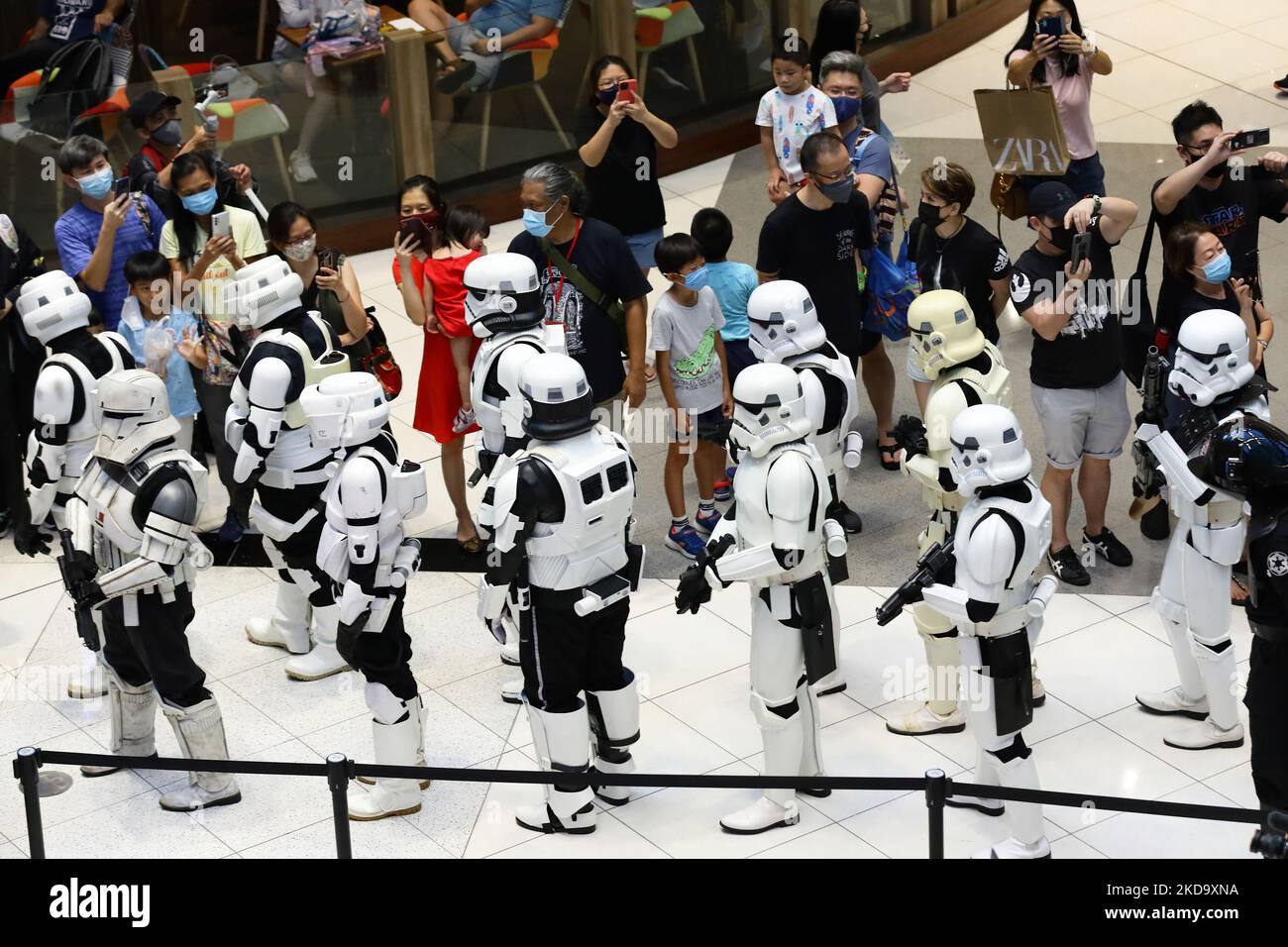 People dress as Star Wars characters march in to assemble at Suntec ...