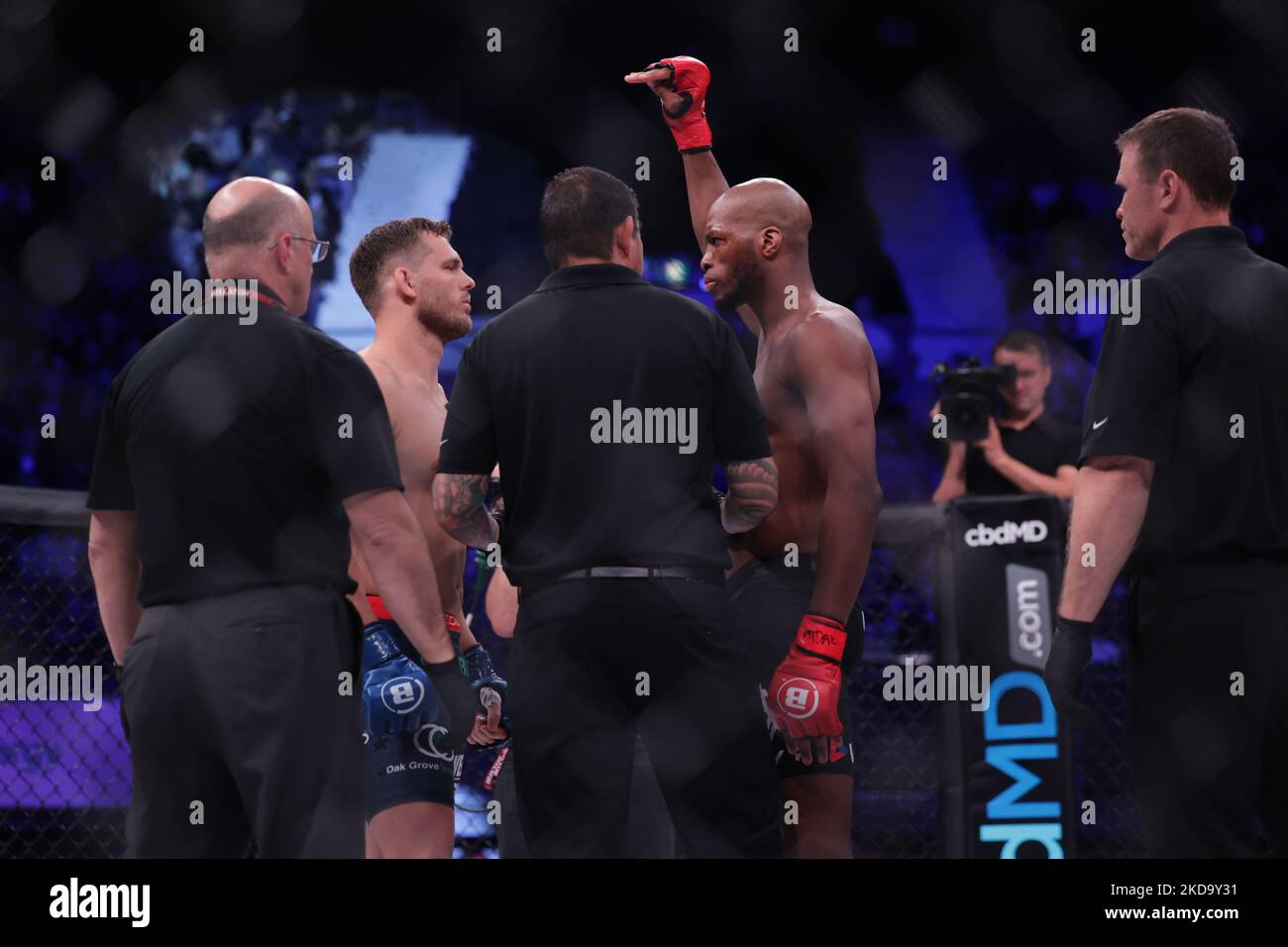 Michael Page raises his hand before his bout with Logan Storley during ...
