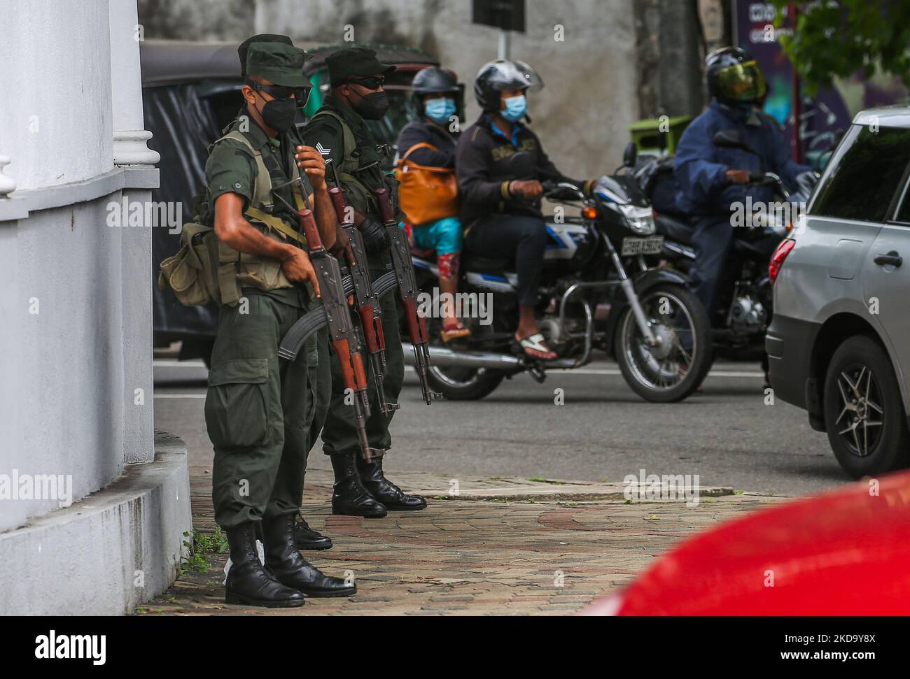 Sri Lankan army soldiers guard along a street in Colombo, Sri Lanka, on ...