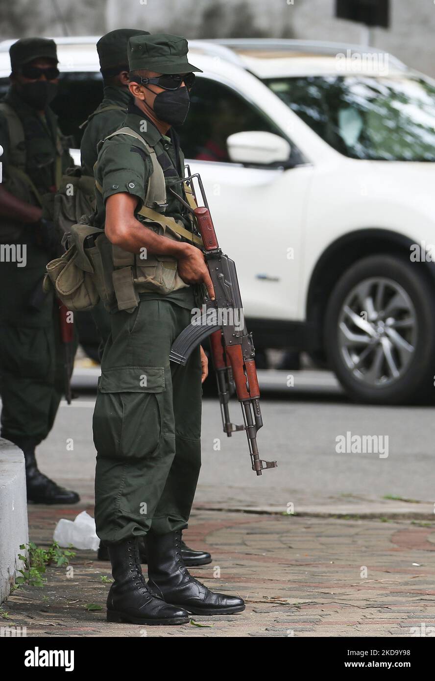 Sri Lankan army soldiers guard along a street in Colombo, Sri Lanka, on ...